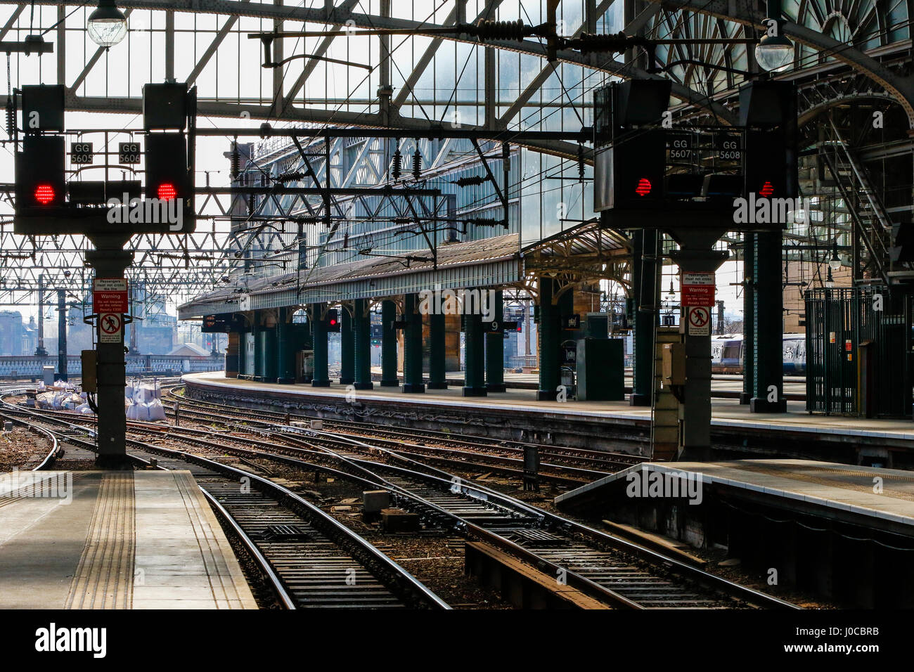 Glasgow central railway station with platforms and rail lines, also showing red light, Glasgow ...