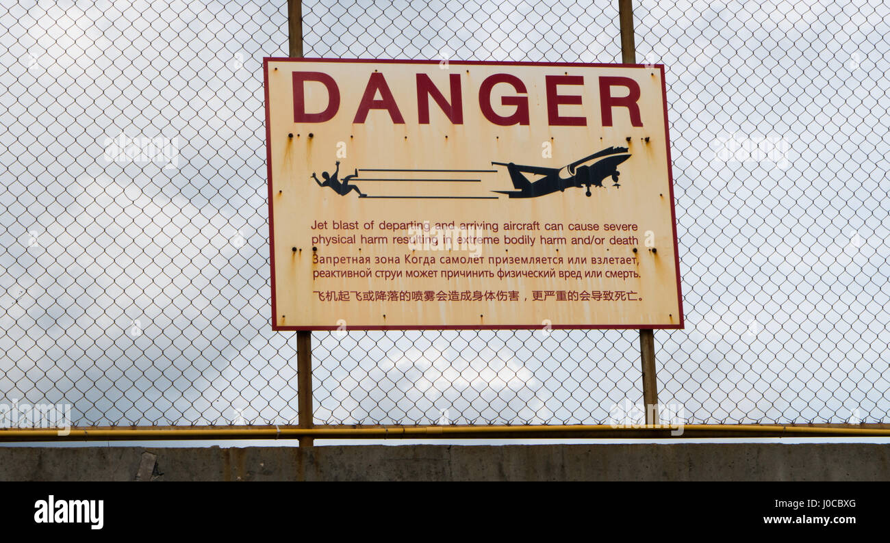 Sign warning of the dangers of jet wash from aircraft landing and ...