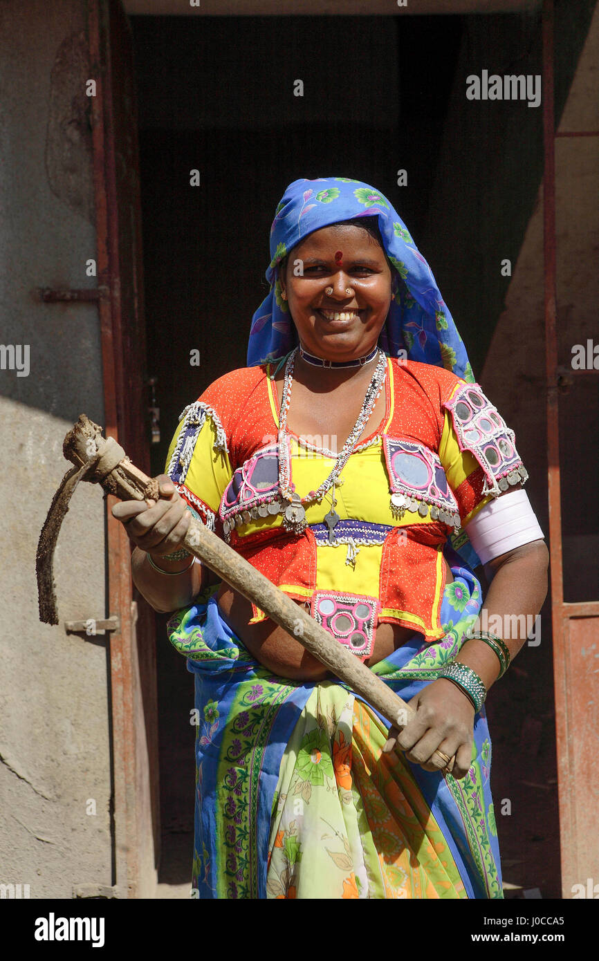 Woman construction worker holding spade, mumbai, maharashtra, india ...