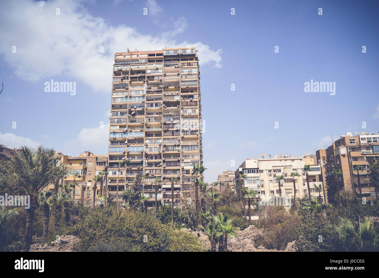 high building with view of green nature Stock Photo - Alamy