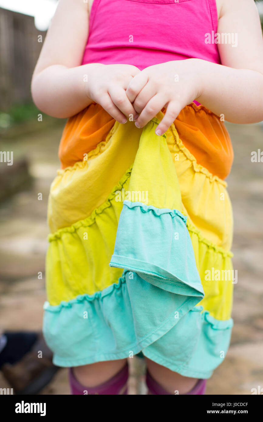 Holding up skirt hi-res stock photography and images - Alamy