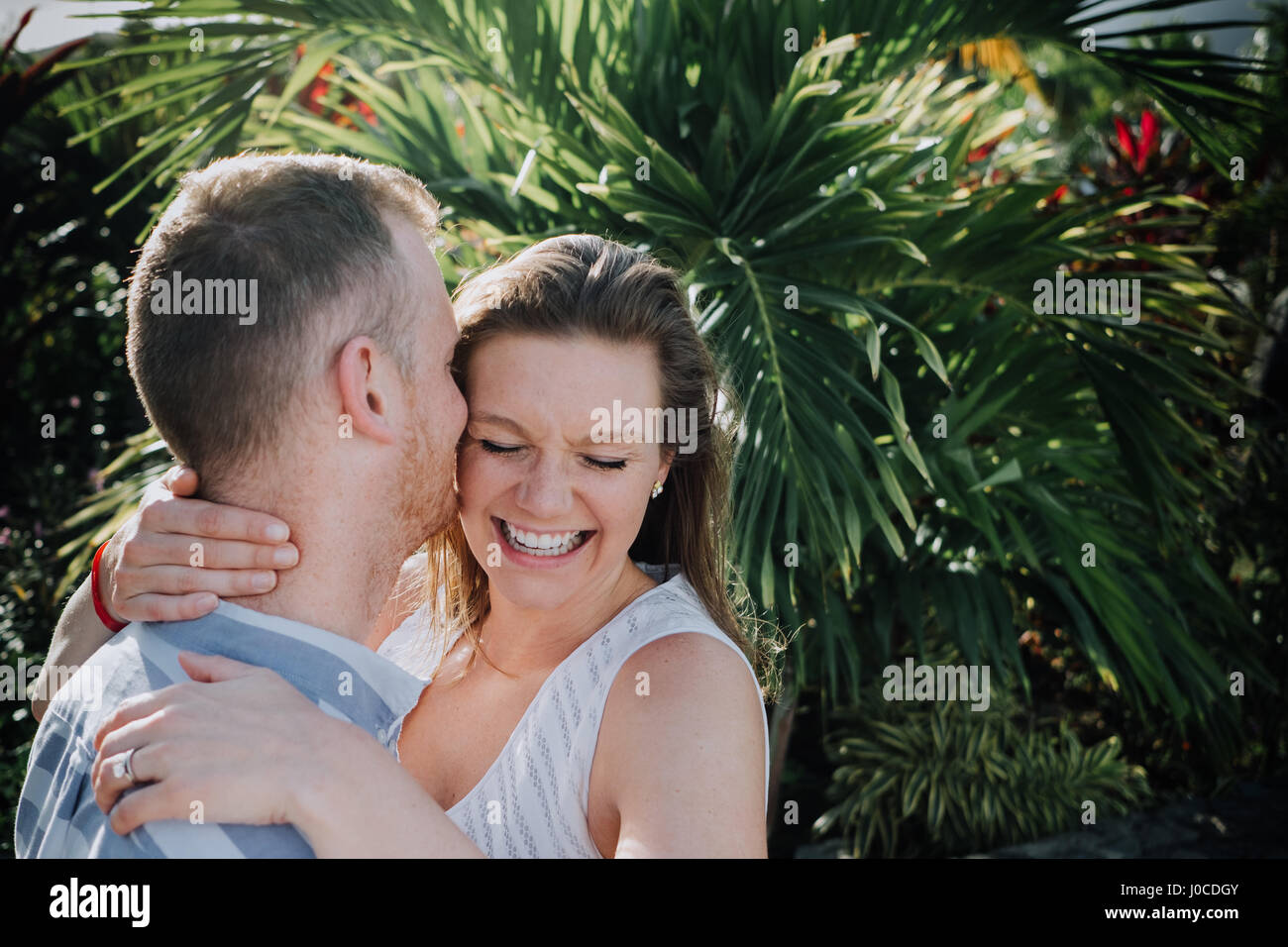Couple fooling around, hugging, outdoors Stock Photo - Alamy