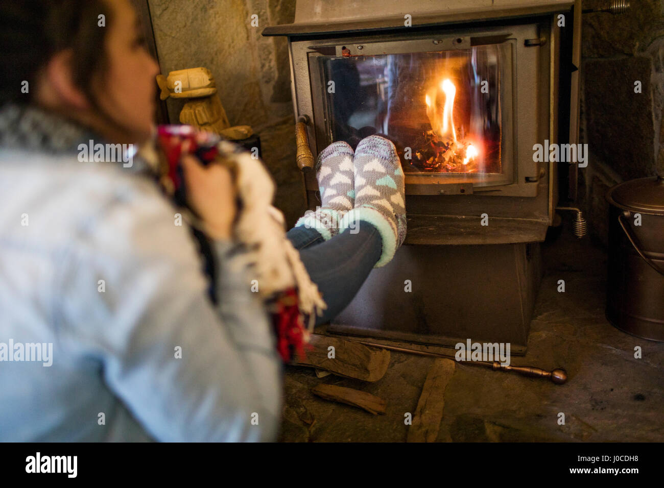 Feet to the fire hi-res stock photography and images - Alamy