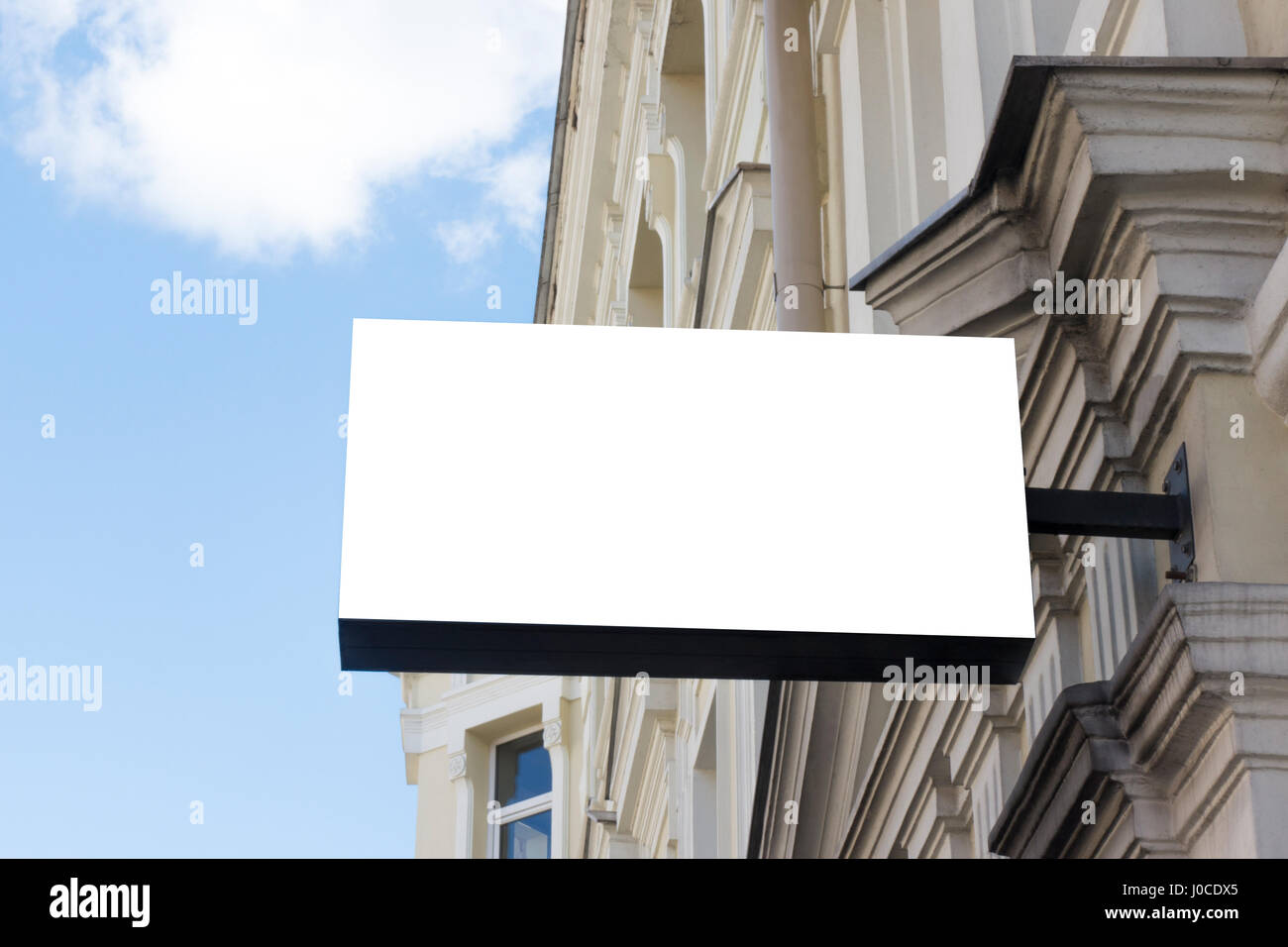 Mock up. Rectangular shape signage on the wall of classical ...