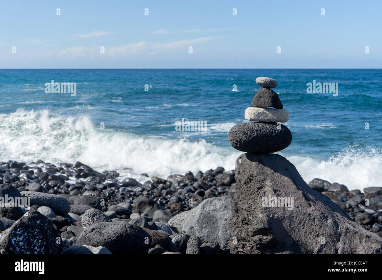 Stacked lava stones at the Atlantic Stock Photo - Alamy