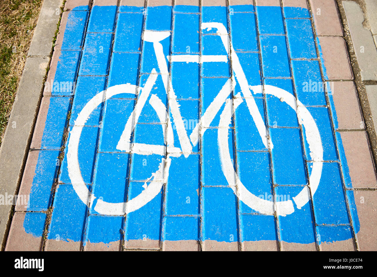 blue bicycle sign at the pedestrian road Stock Photo - Alamy