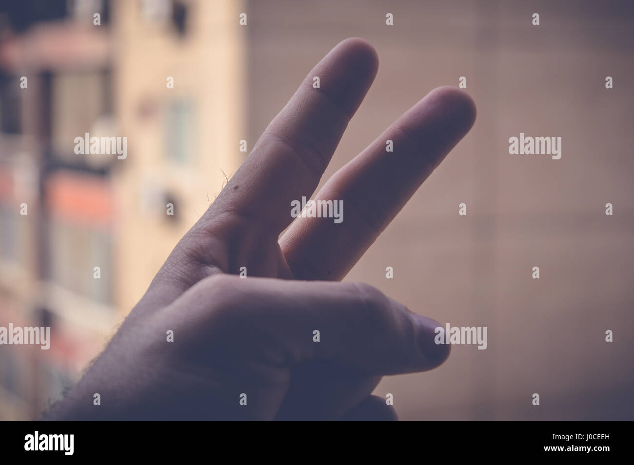 victory hand sign Stock Photo - Alamy