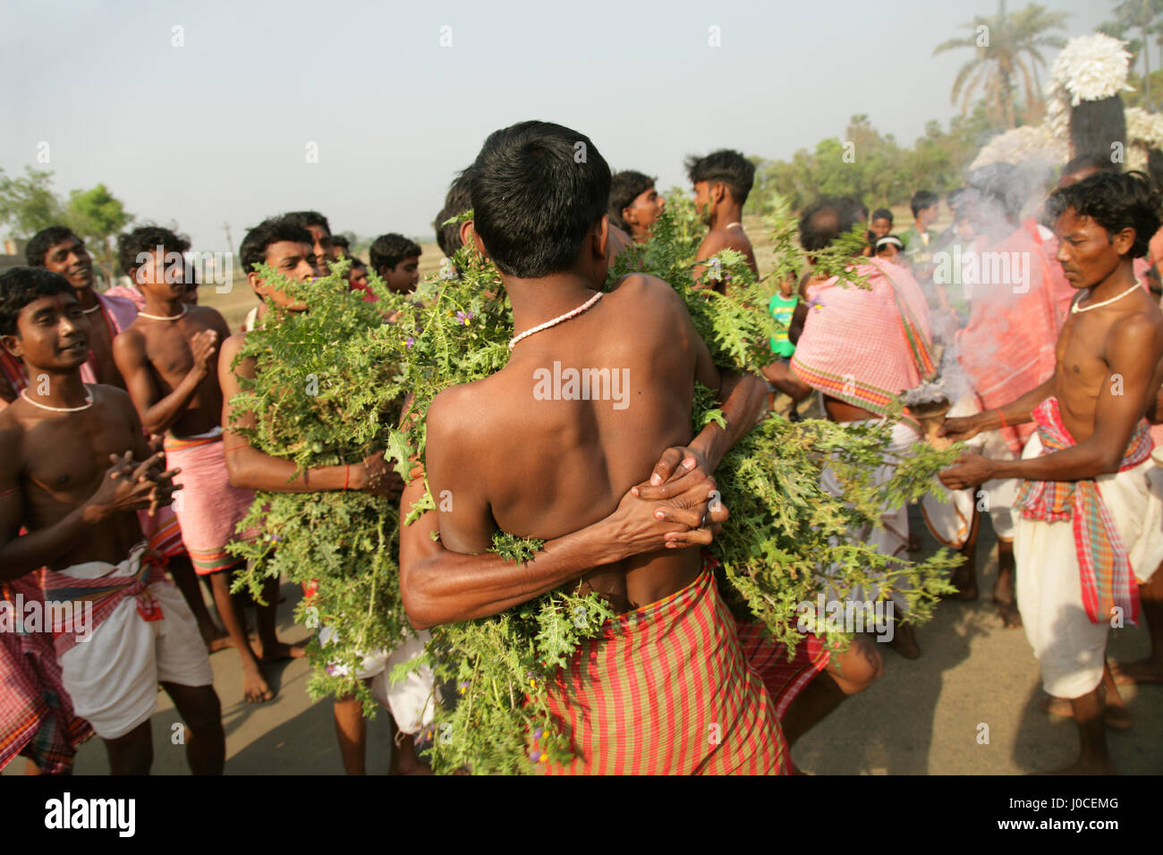 People hugging with thorn bush, charak puja, birbhum, west bengal ...