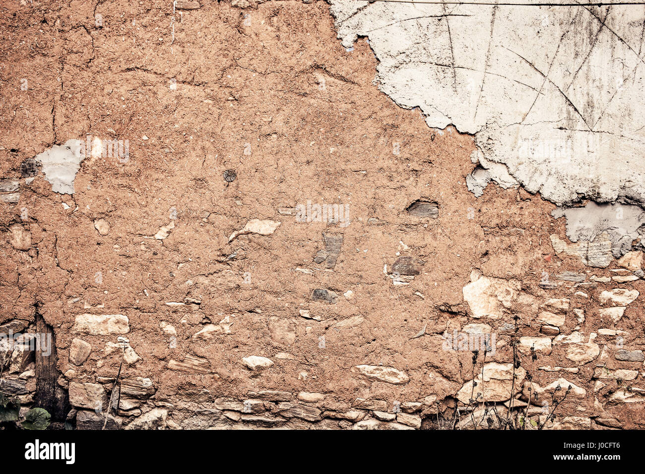 Wall of a village house Stock Photo - Alamy