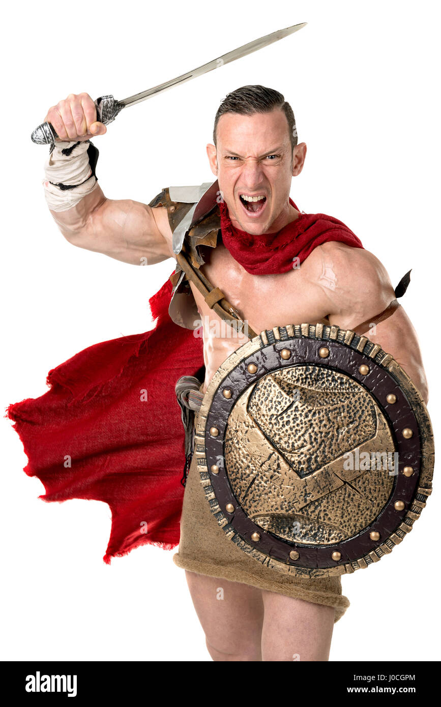 Ancient warrior or Gladiator posing over a white background Stock Photo ...