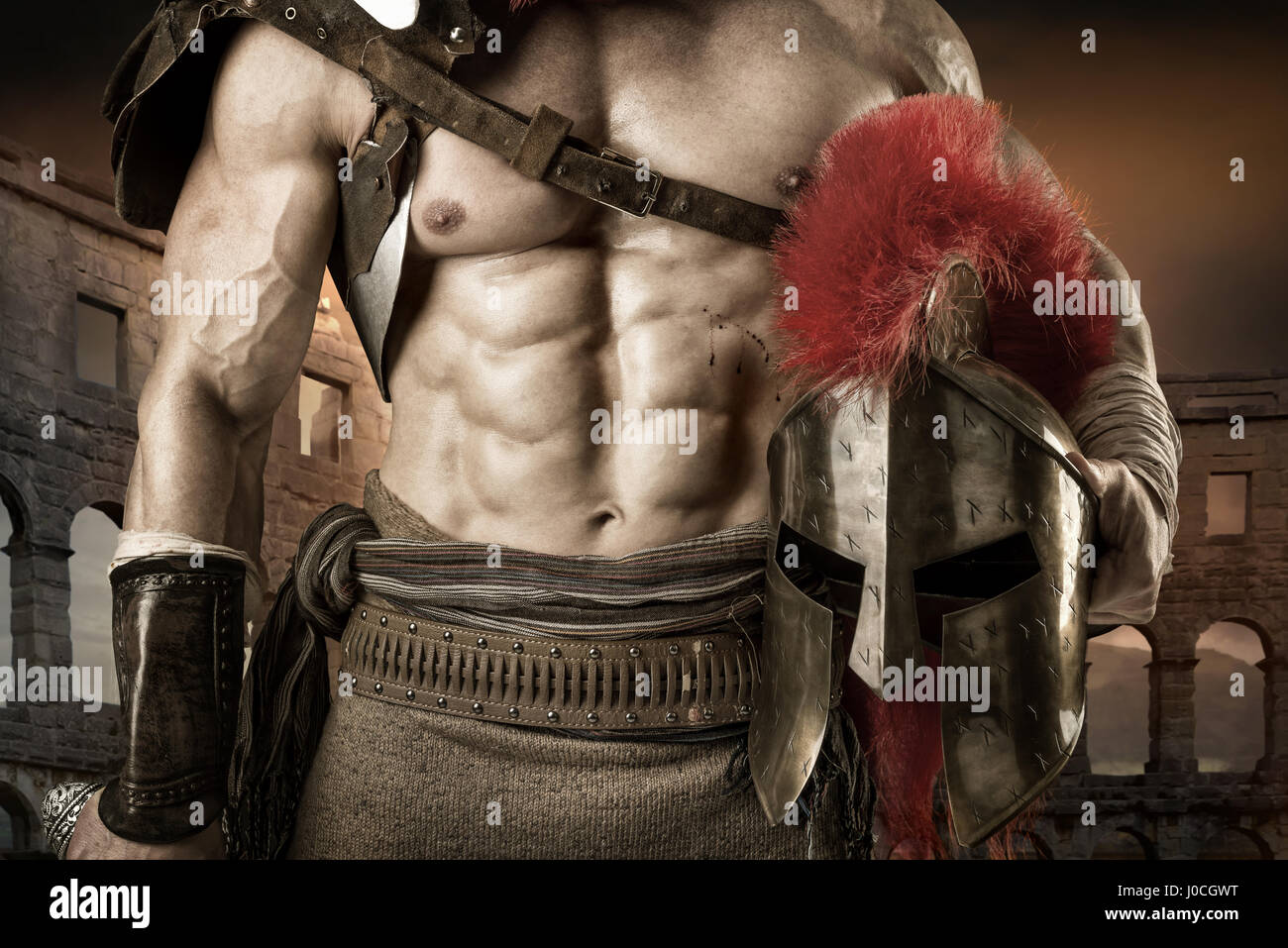 Ancient warrior or Gladiator posing in the arena Stock Photo - Alamy