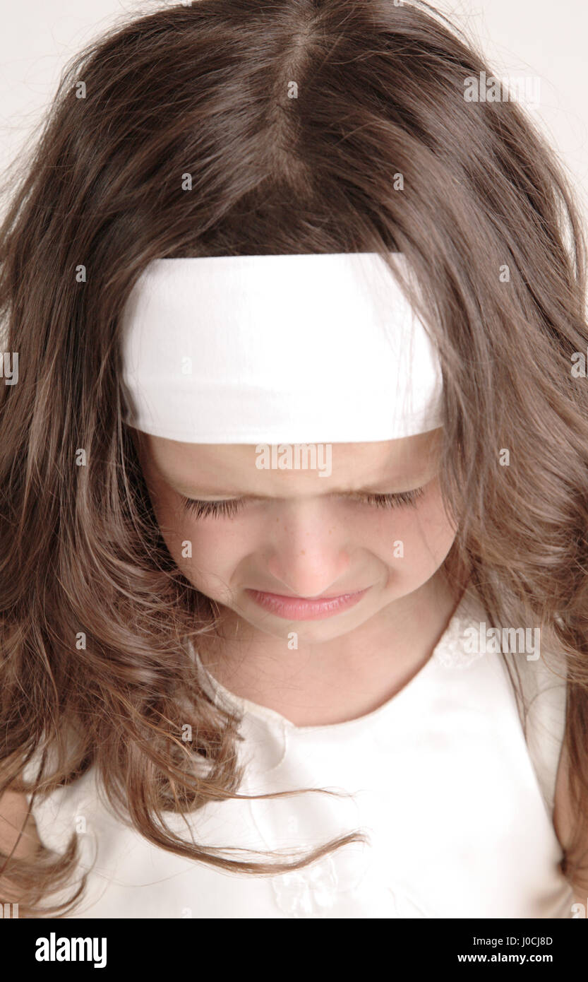 Sad brown haired child hi-res stock photography and images - Alamy