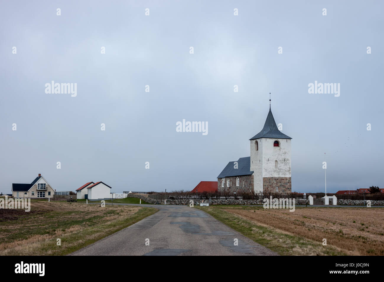 small danish village with big church Stock Photo - Alamy