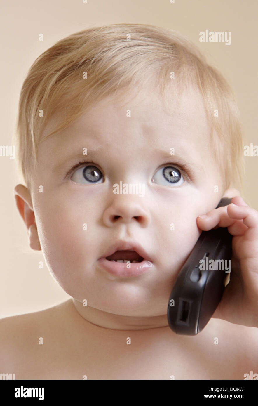 Little boy with phone Stock Photo - Alamy