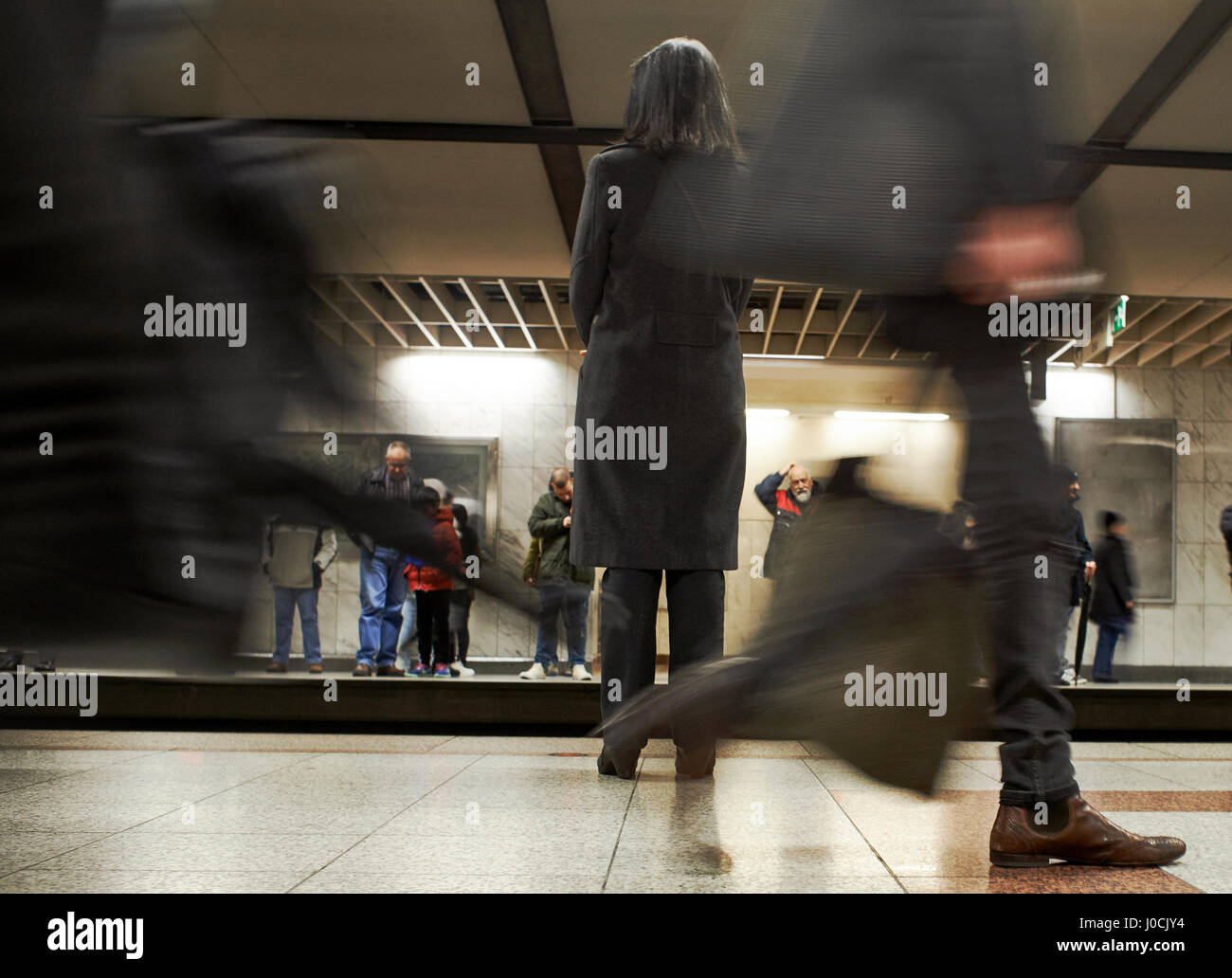 People in a metro station Stock Photo - Alamy