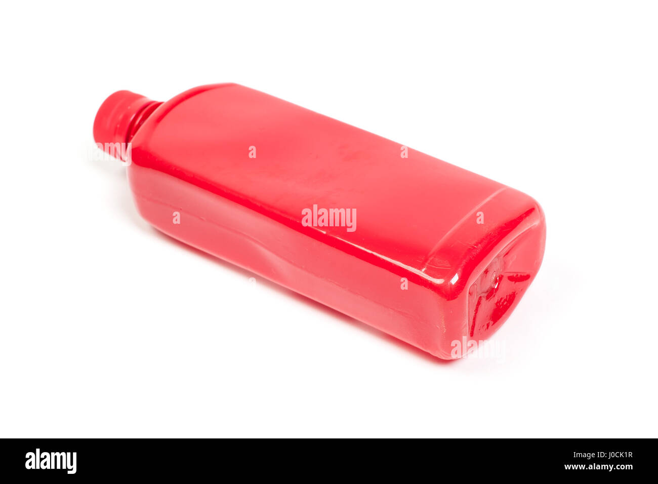 Red plastic bottle isolated on white background Stock Photo - Alamy