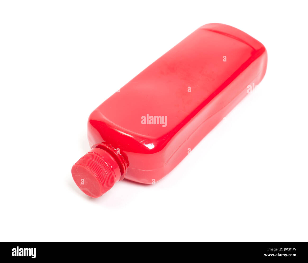 Red plastic bottle isolated on white background Stock Photo - Alamy