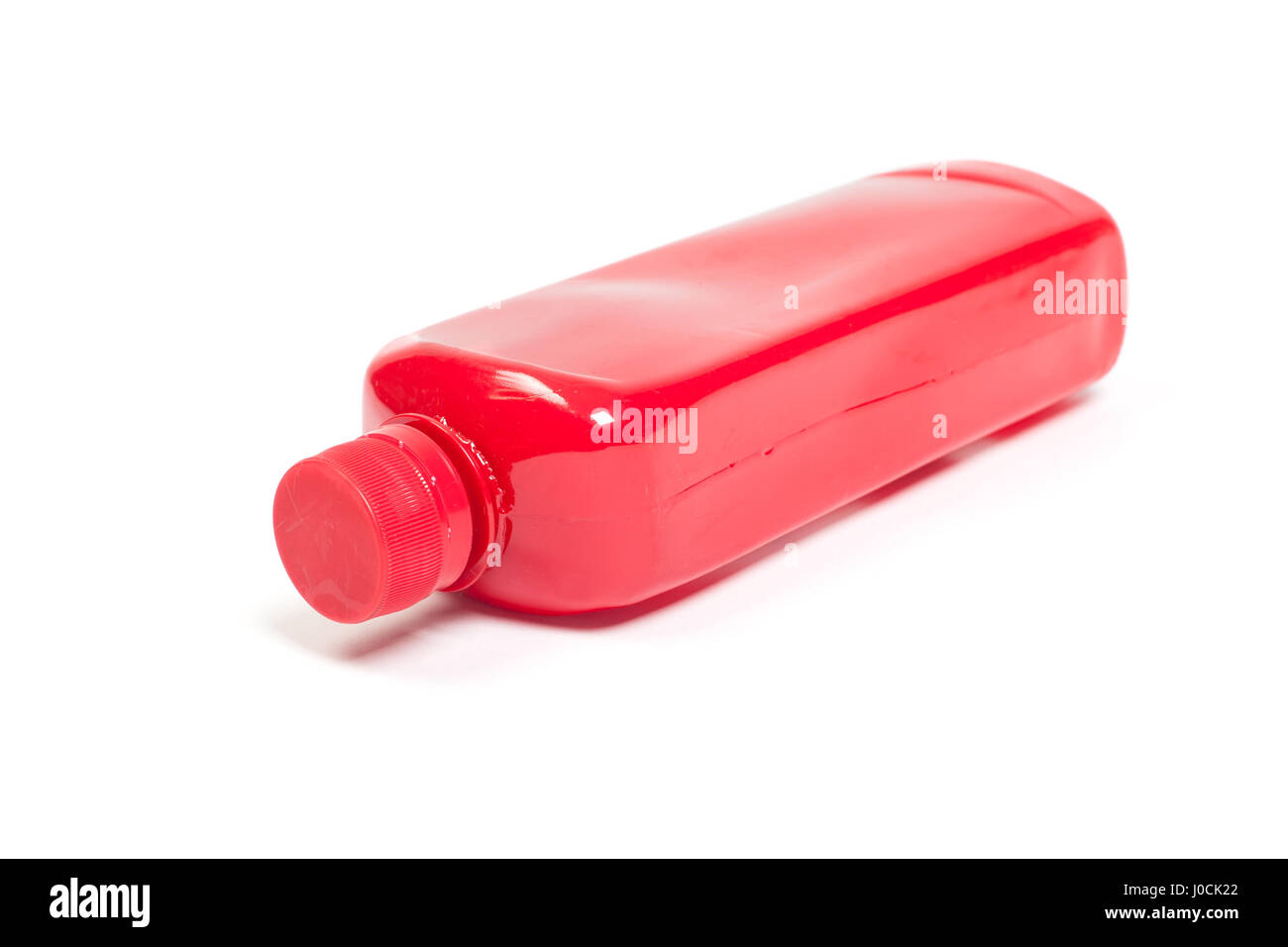 Red plastic bottle isolated on white background Stock Photo - Alamy
