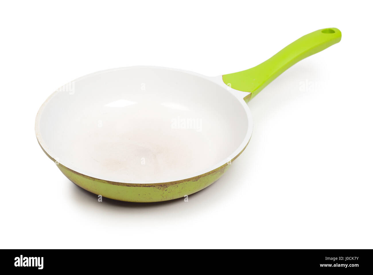 Dirty frying pan isolated on white Stock Photo - Alamy