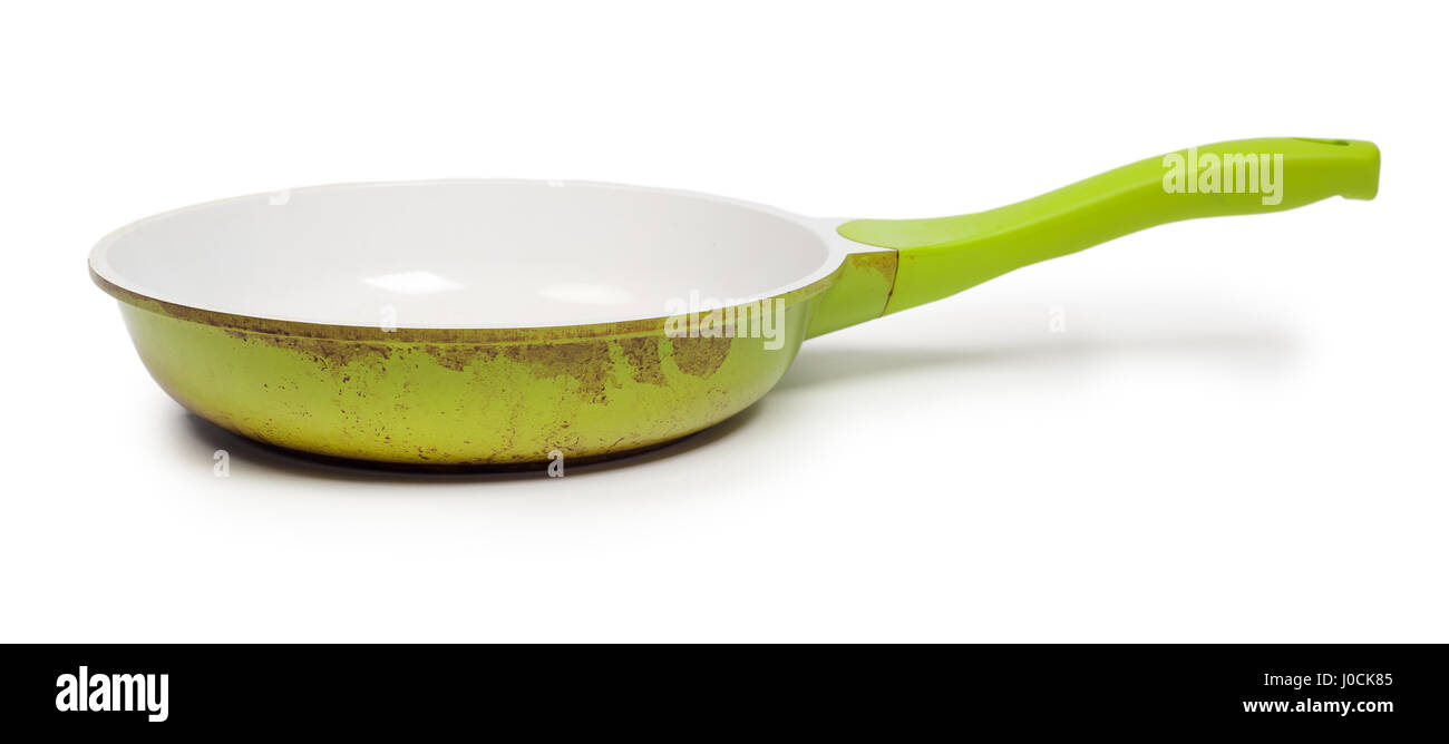 Dirty frying pan isolated on white Stock Photo - Alamy