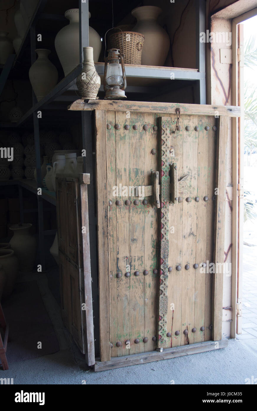 Traditional wooden door at the A'ali Pottery, Bahrain Stock Photo - Alamy