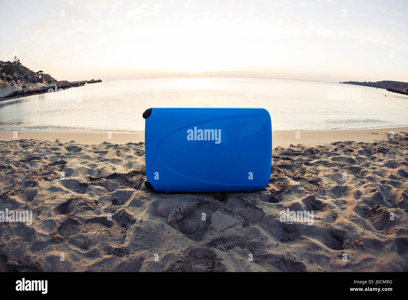 Travel, holiday and vacation concept - blue suitcase on the beach Stock ...