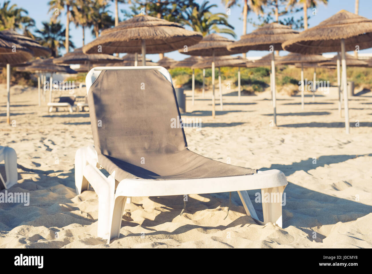 Sunbeds on the sea beach Stock Photo - Alamy