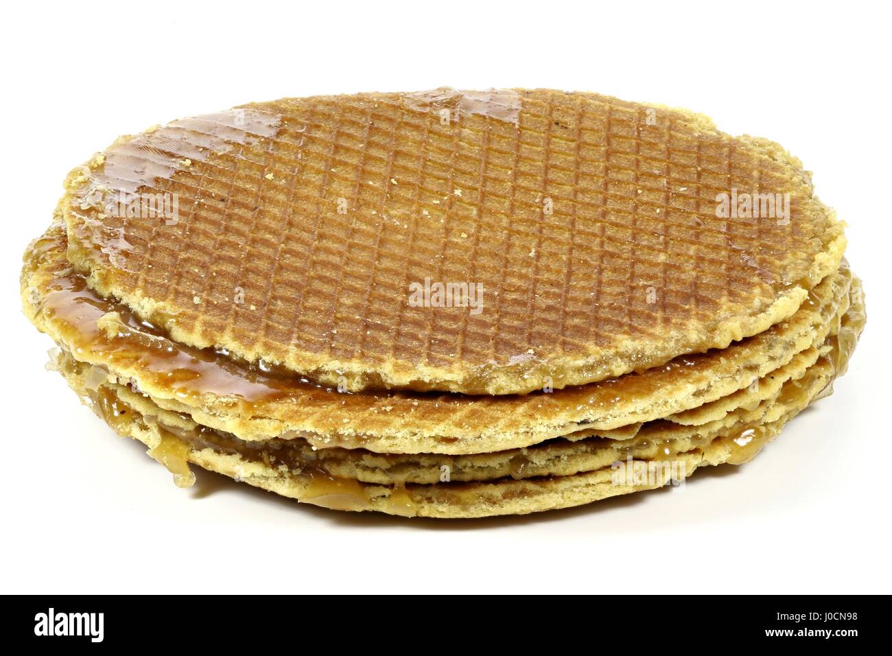 large dutch syrup waffles isolated on white background Stock Photo - Alamy