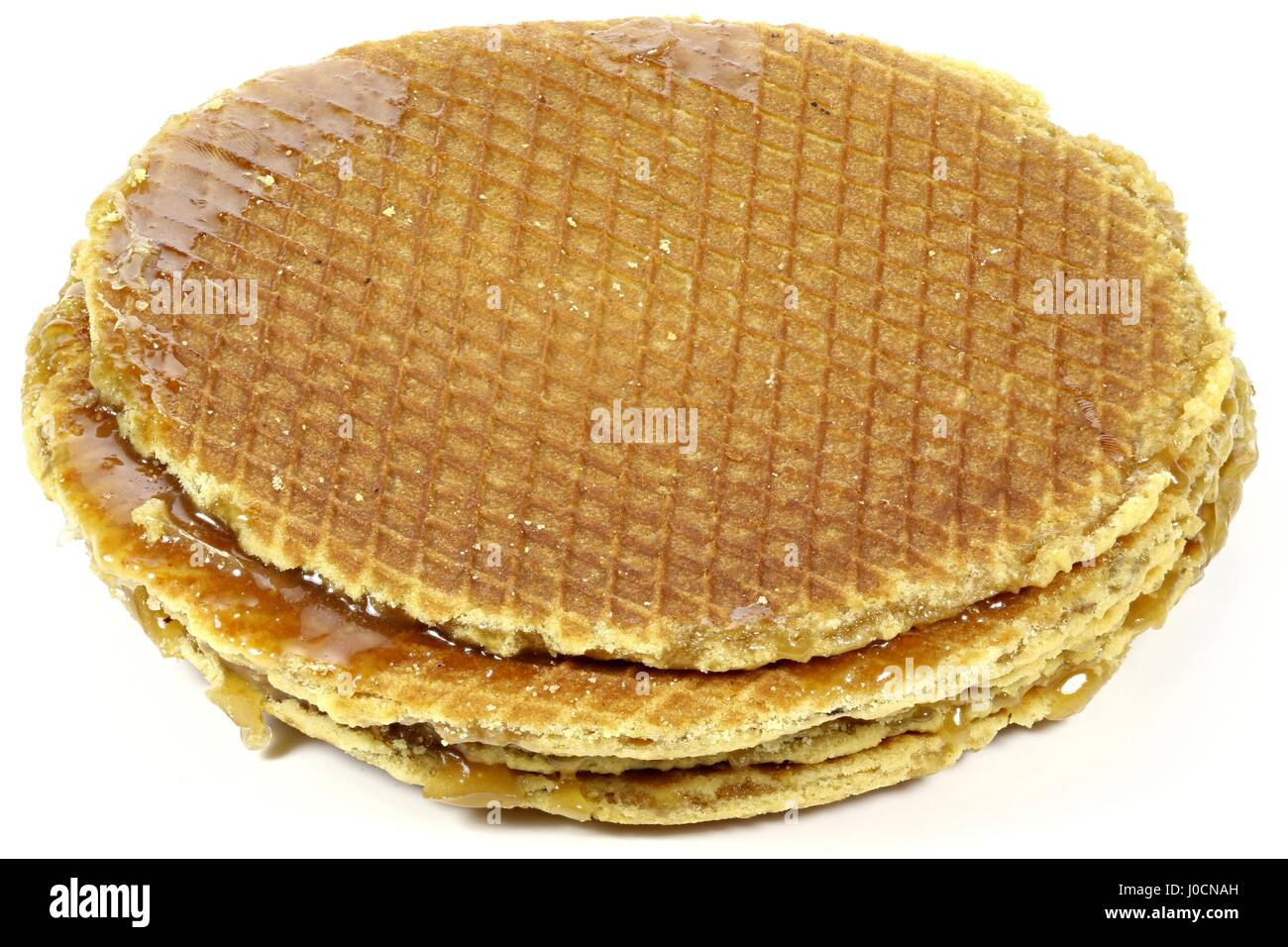 large dutch syrup waffles isolated on white background Stock Photo - Alamy