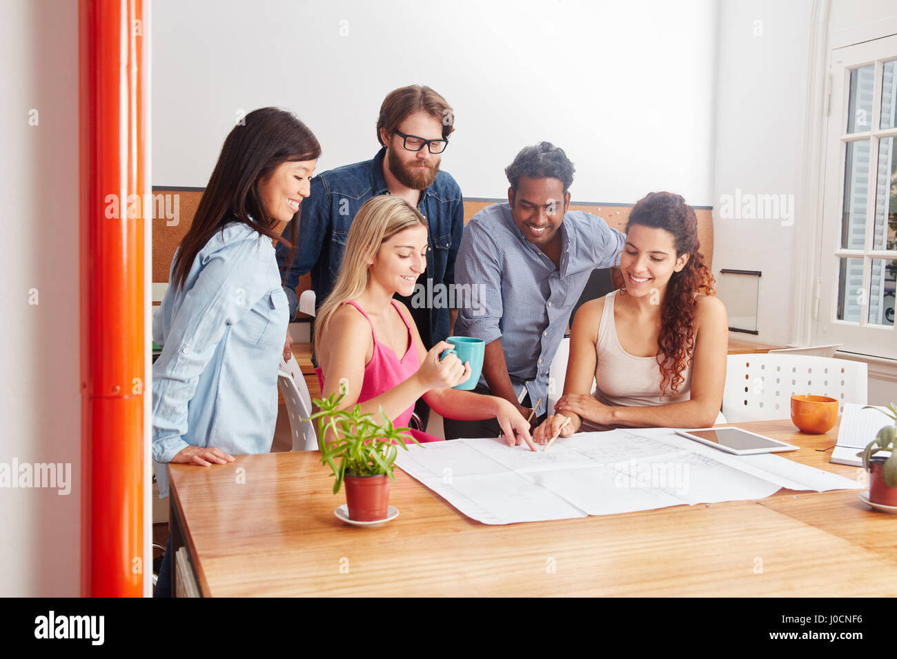 Startup team planning project strategy in teamwork Stock Photo - Alamy