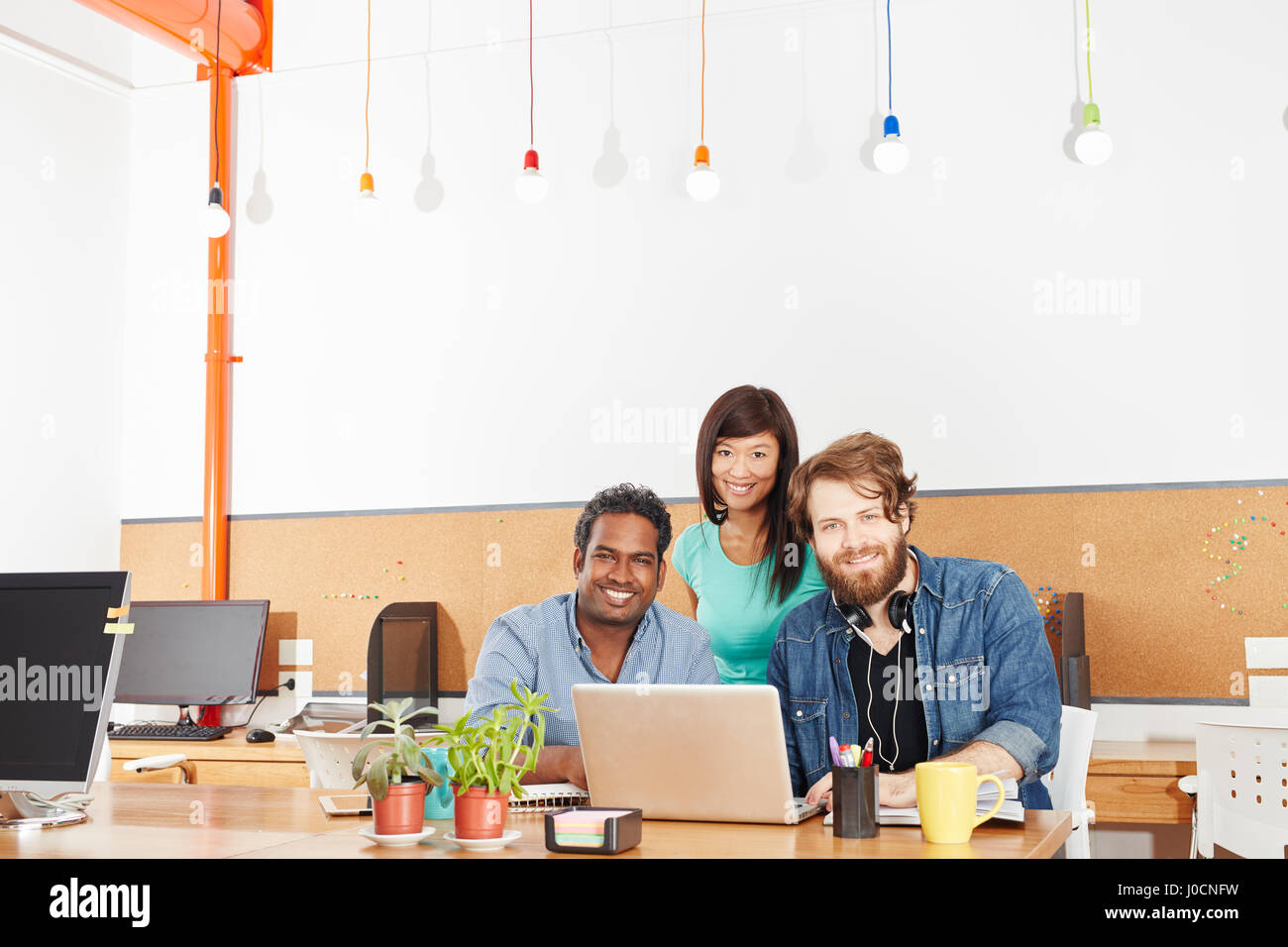 Startup business team working with laptop computer in cooperation Stock ...