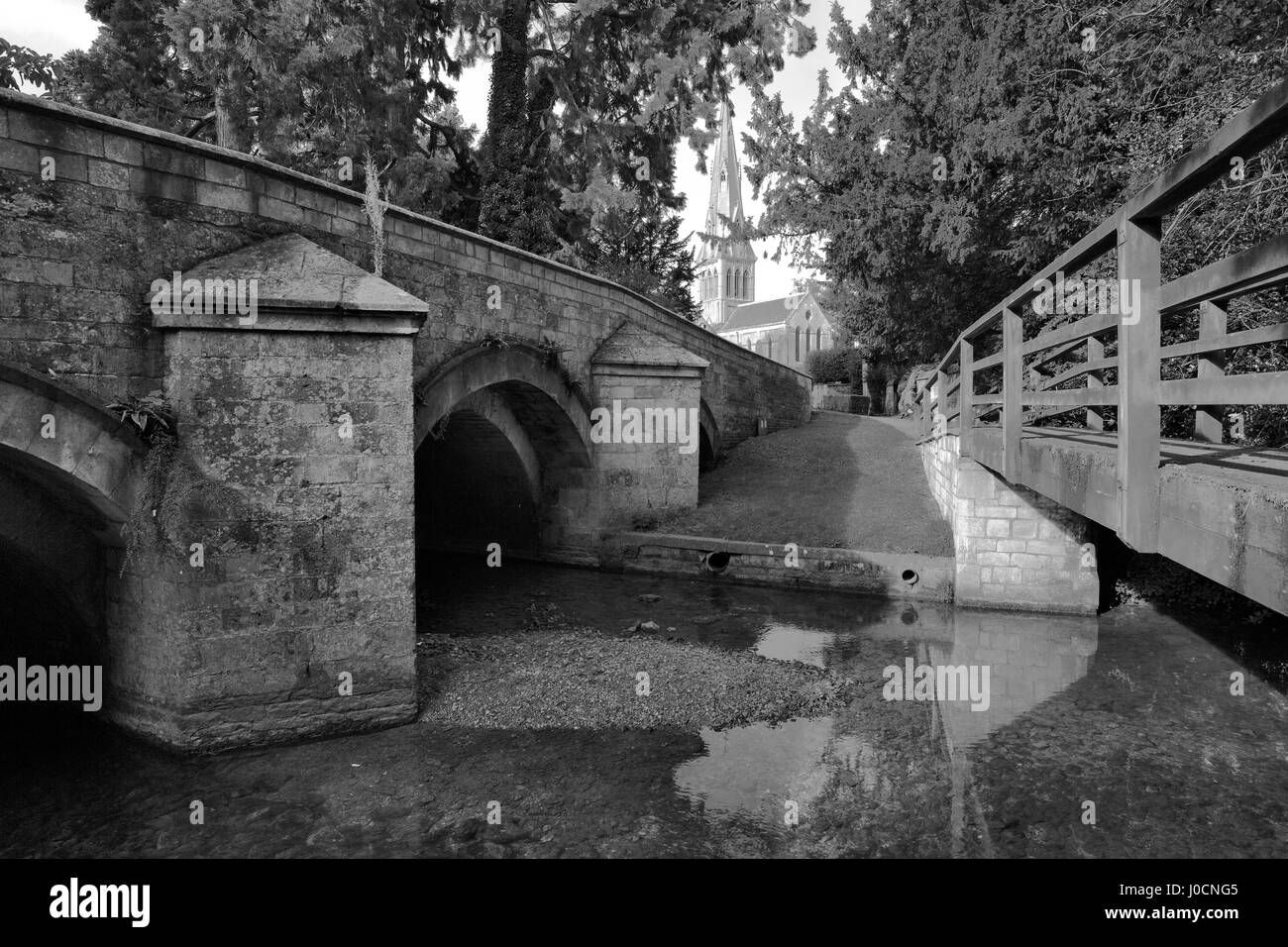 River Chater stone bridge, St Marys church, Ketton village Rutland ...