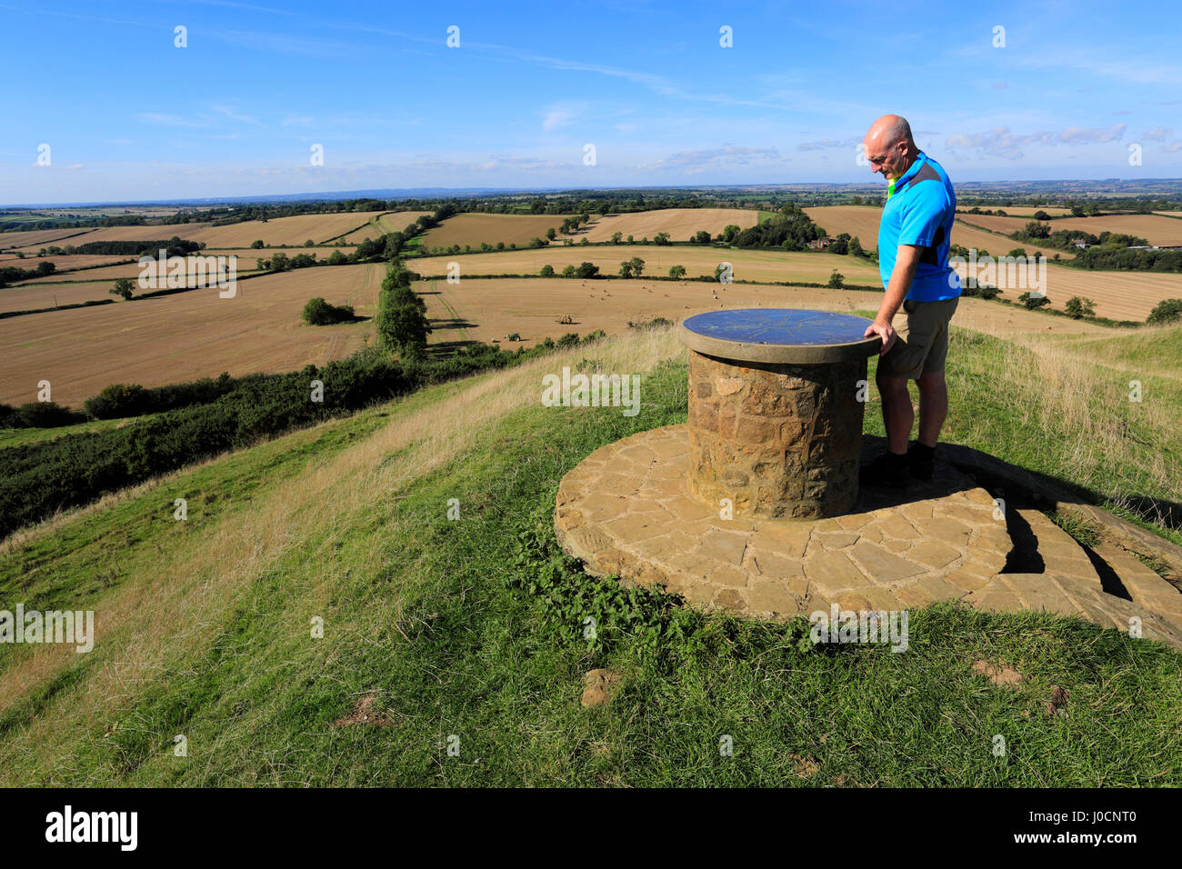 Walker at Burrough Hill Iron Age Hillfort, near Melton Mowbray ...