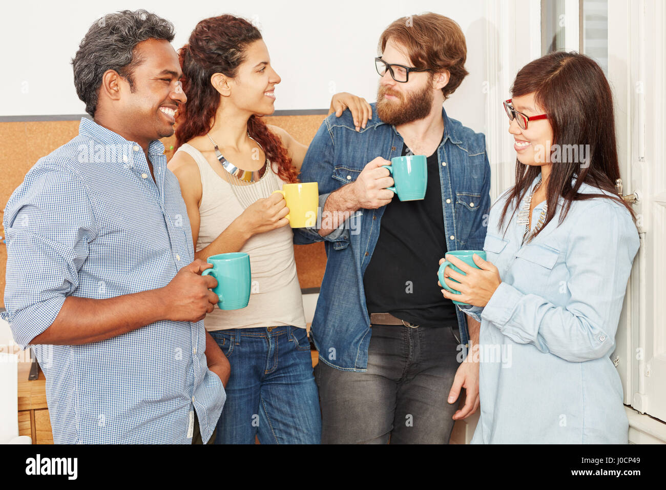 Colleagues in coffee break as team of employees Stock Photo - Alamy