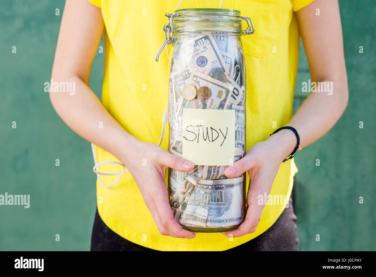 Money for study hi-res stock photography and images - Alamy