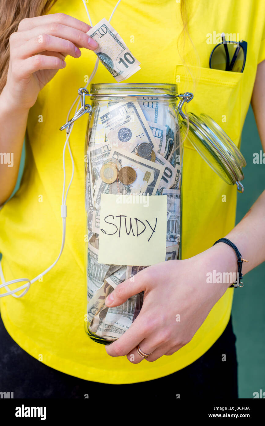 Money for study hi-res stock photography and images - Alamy