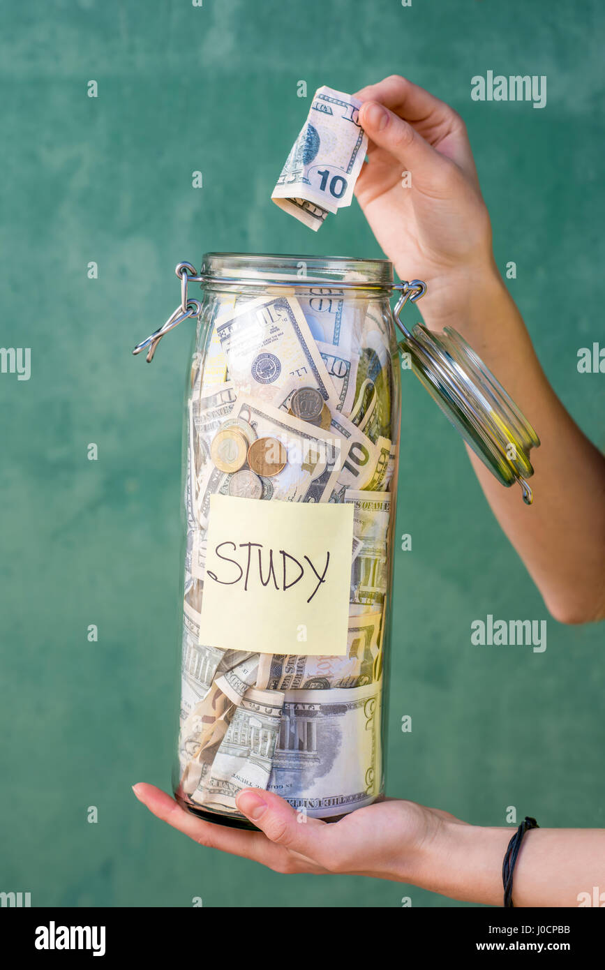 Money for study hi-res stock photography and images - Alamy