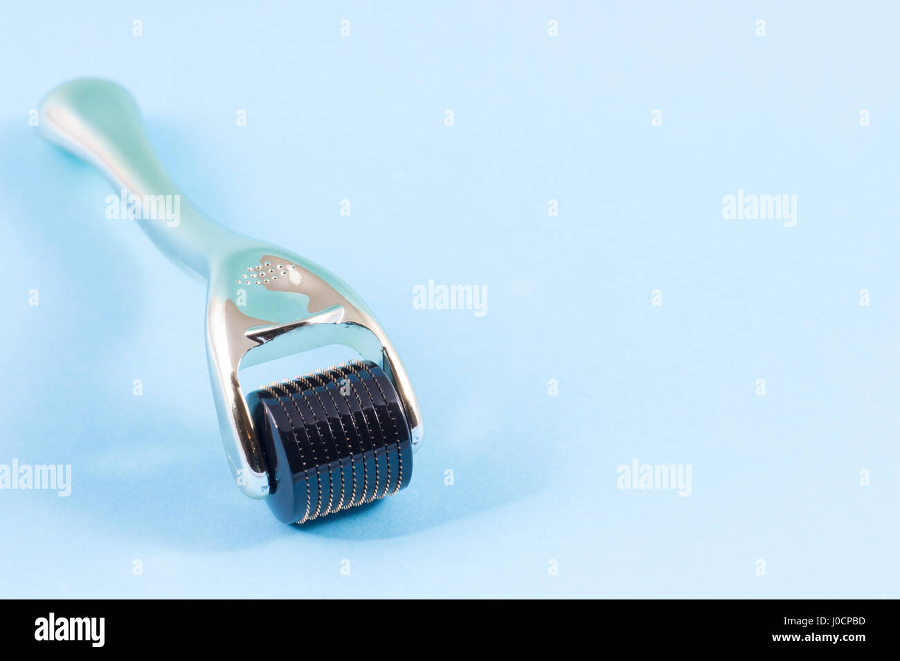 Derma roller for medical micro needling therapy. Tool also known as ...