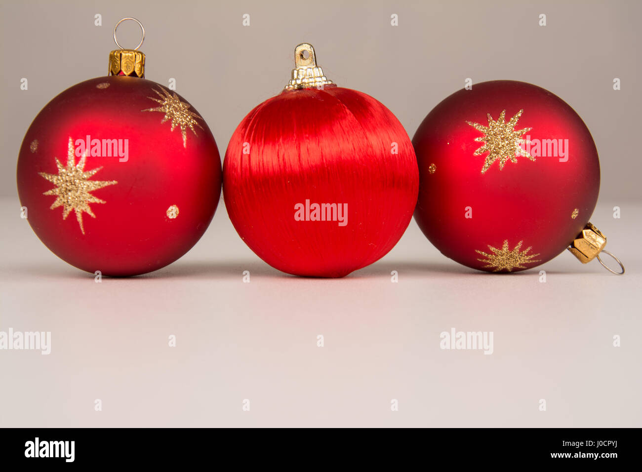 Closeup of red Christmas balls Stock Photo - Alamy