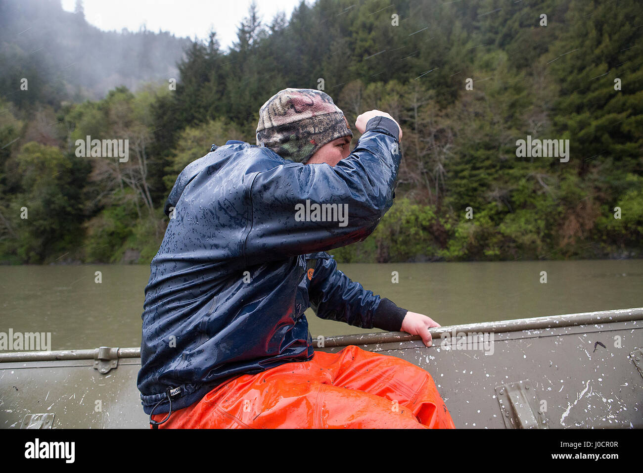 A member of the Yurok Indian Tribe fishes for sturgeon on the Klamath ...