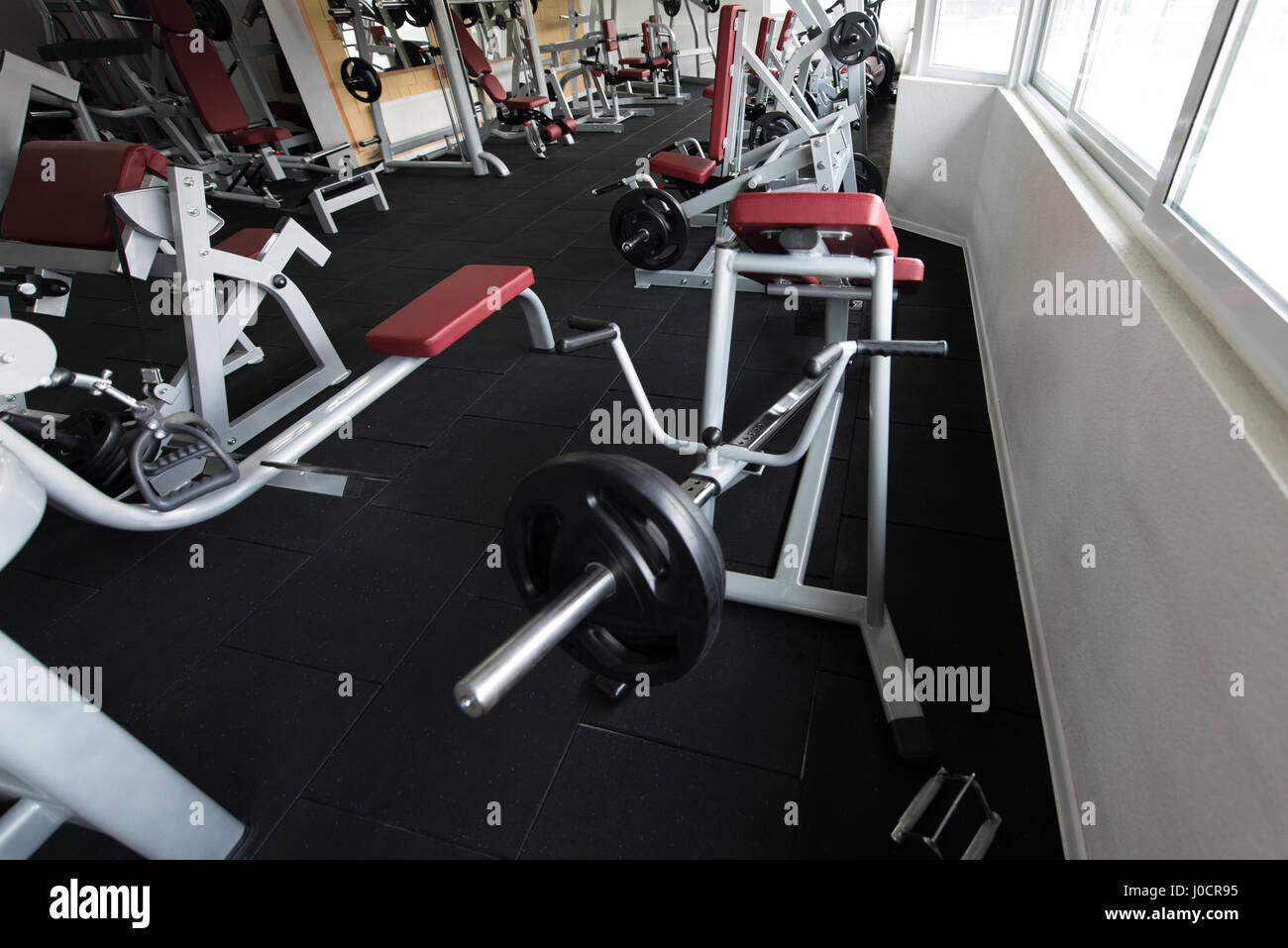 Modern Gym Room Fitness Center With Equipment And Machines Stock Photo ...