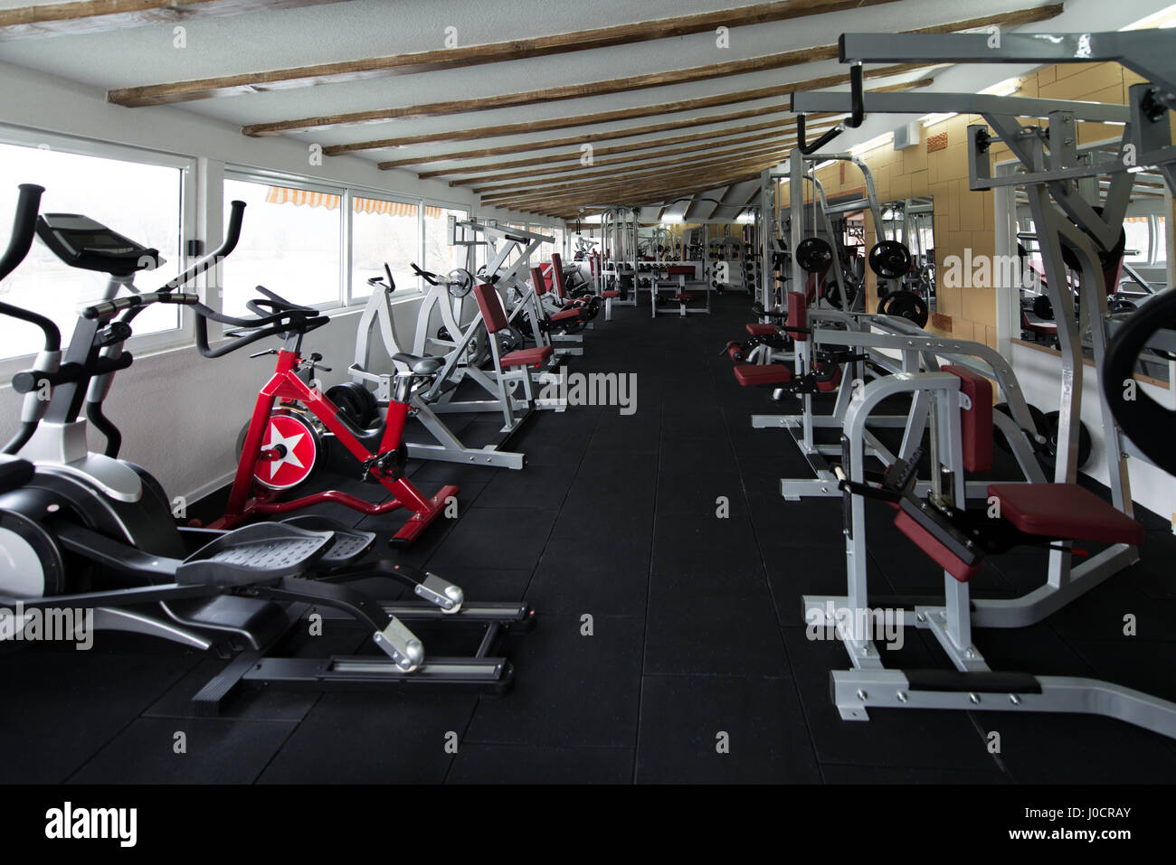 Modern Gym Room Fitness Center With Equipment And Machines Stock Photo ...