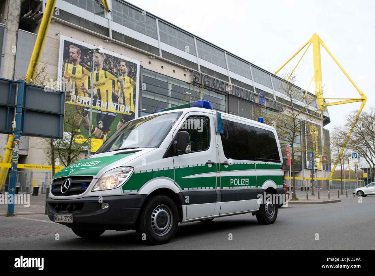 Dortmund, Germany. 12th Apr, 2017. A police car parks outside the ...