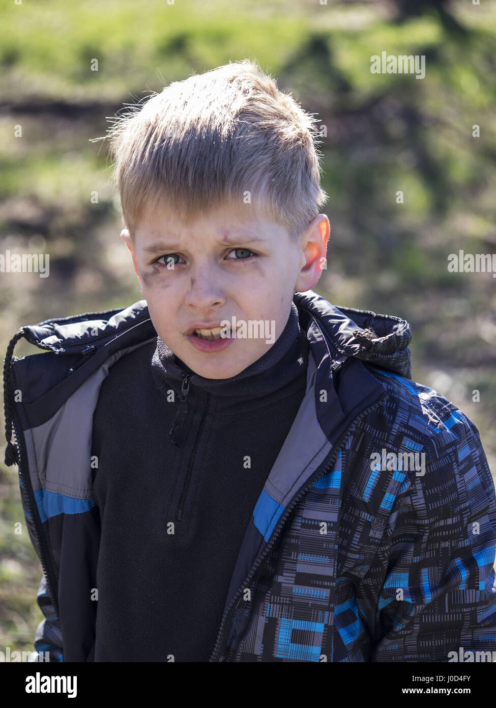 Portrait of a Caucasian boy smeared with soot. 9th Apr, 2017. Credit ...