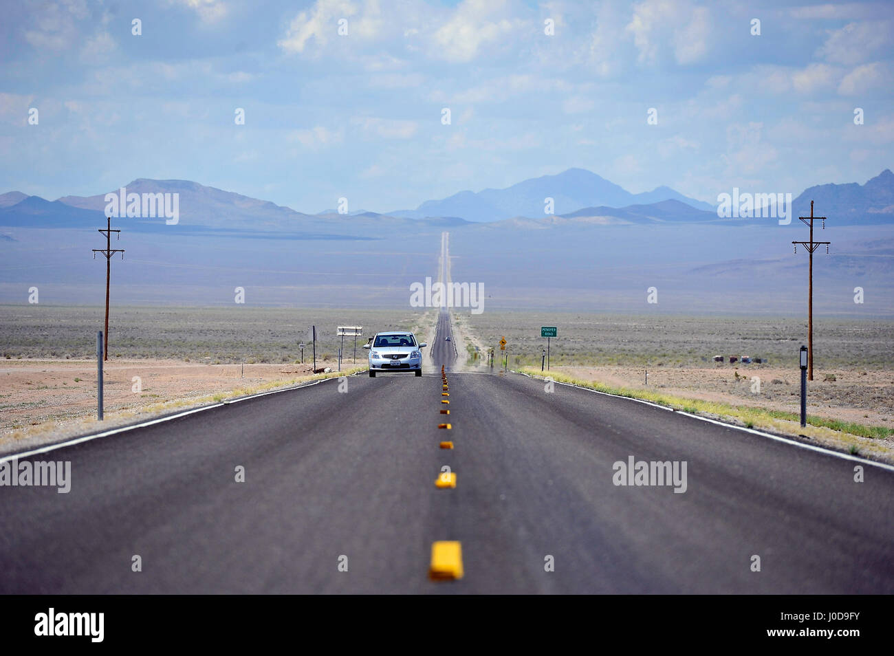 Rachel, Nevada, USA. 5th Aug, 2014. A vehicle travel along Nevada state ...