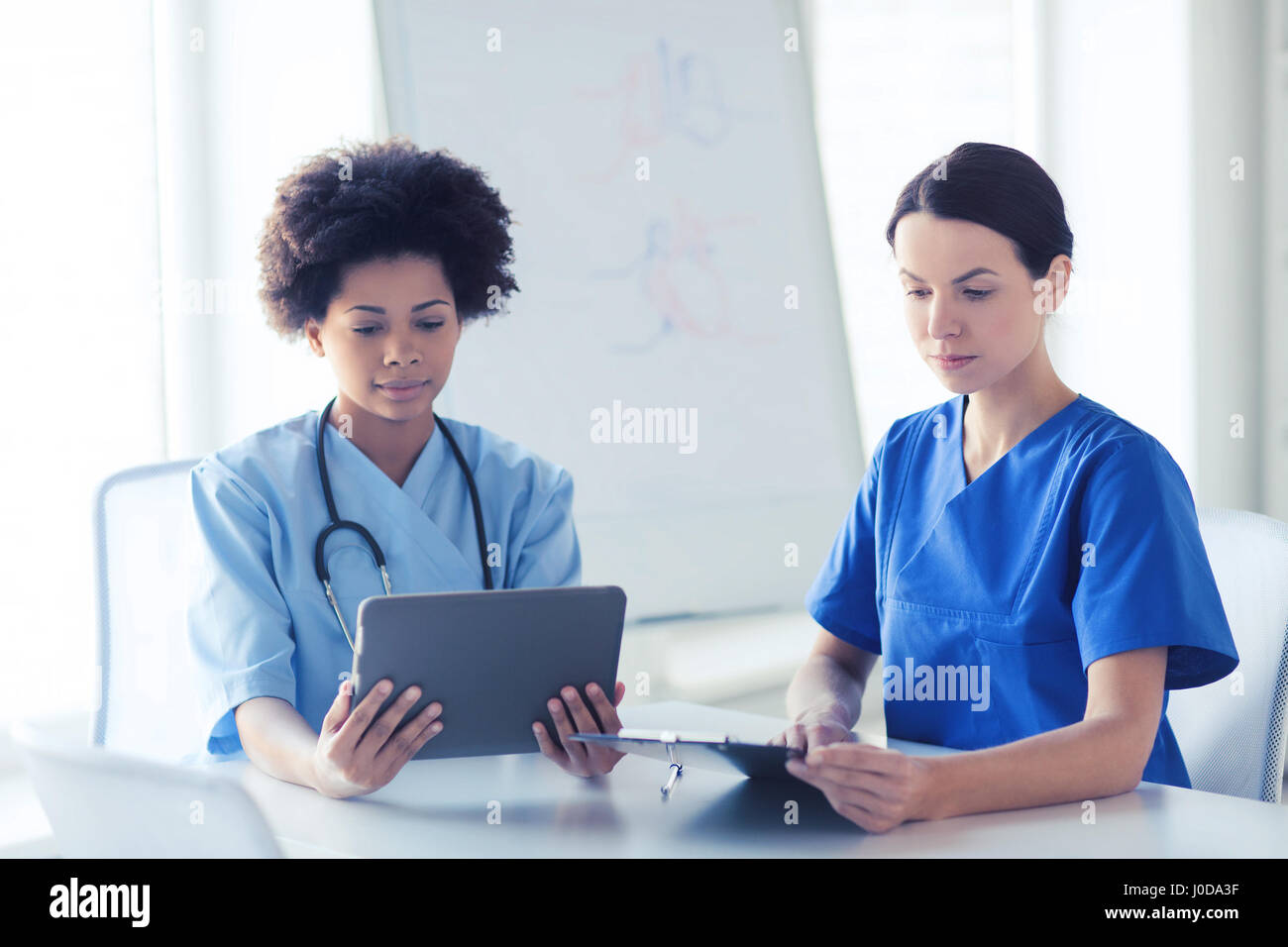 African female doctors tablet hi-res stock photography and images - Alamy