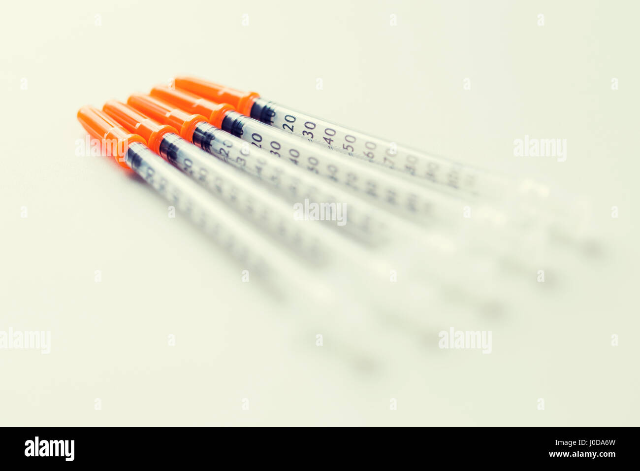 Insulin syringes hi-res stock photography and images - Alamy
