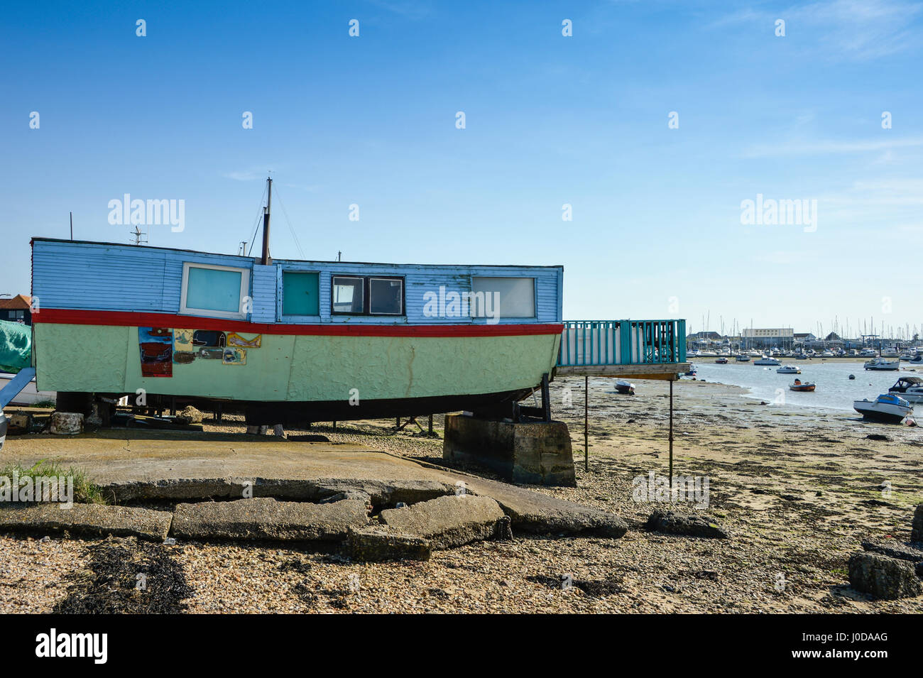 Old houseboat at Eastney in Langstone Harbour, nr Portsmouth, Hampshire ...