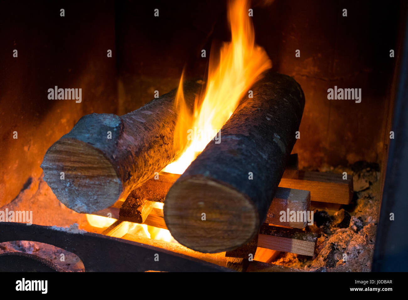 Firewood burns in the fireplace hi-res stock photography and images - Alamy