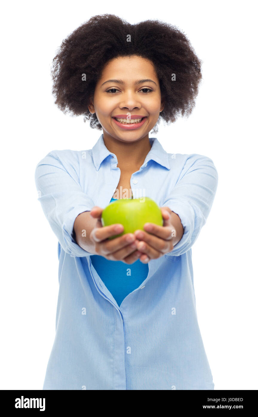 happy african american woman with green apple Stock Photo - Alamy